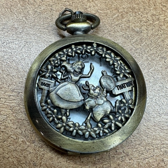 Disney | Accessories | Alice In Wonderland Theme Quartz Disney Pocket ...